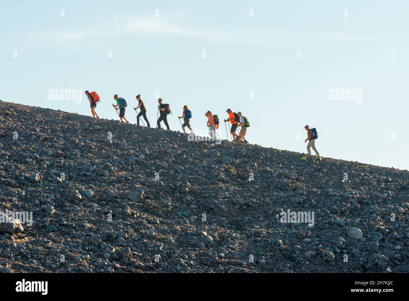 Hikers walking around Gran Crater rim, Vulcano Island, Aeolian Islands ...