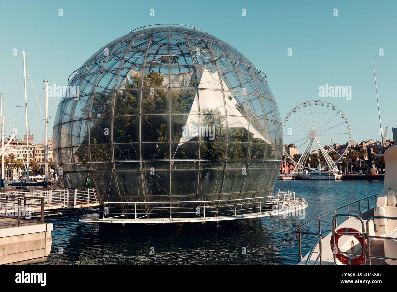 View of the port of Genoa dominated by the biosphere green house ...