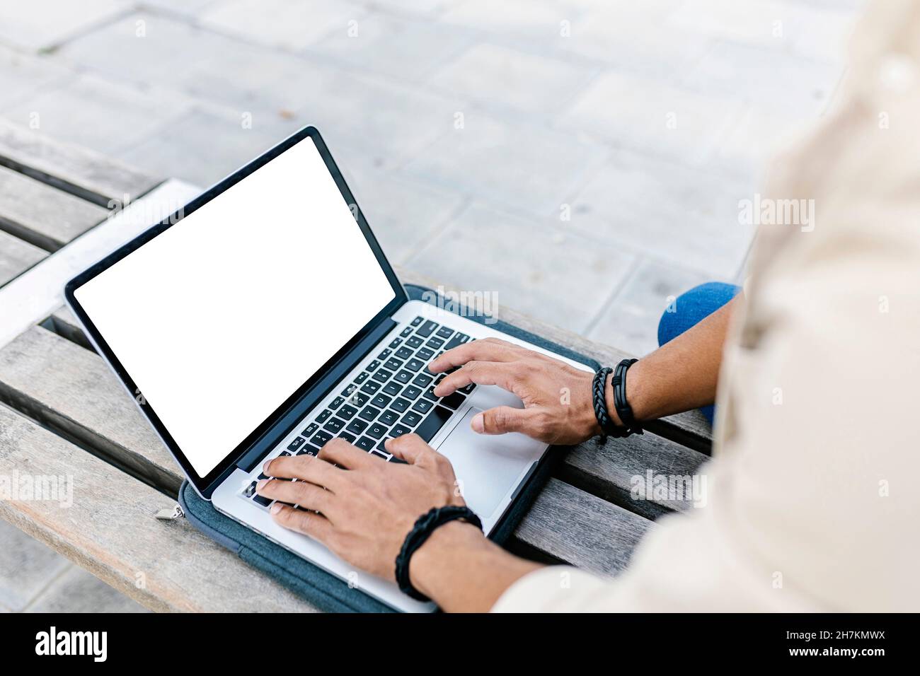 One hispanic young man typing hi-res stock photography and images - Alamy