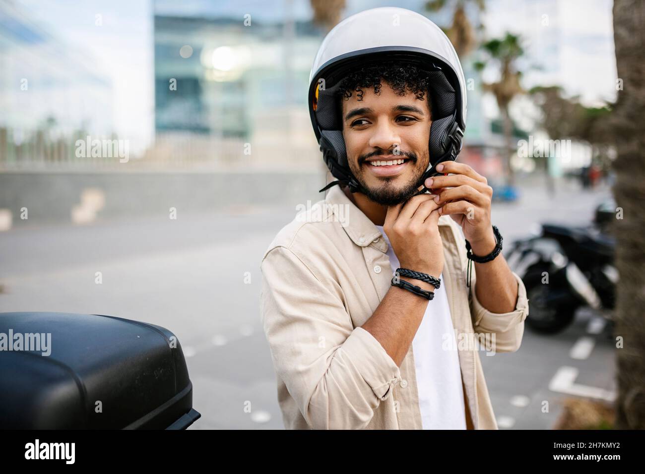 Man wearing crash helmet hi-res stock photography and images - Alamy