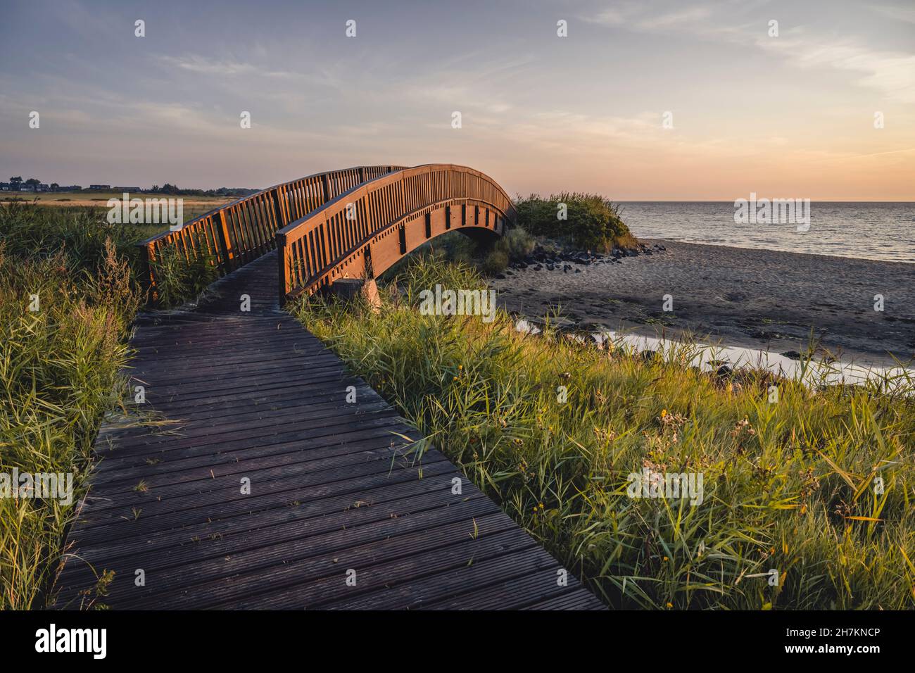 Coastal boardwalk and Lugenbrucke bridge at dusk Stock Photo - Alamy