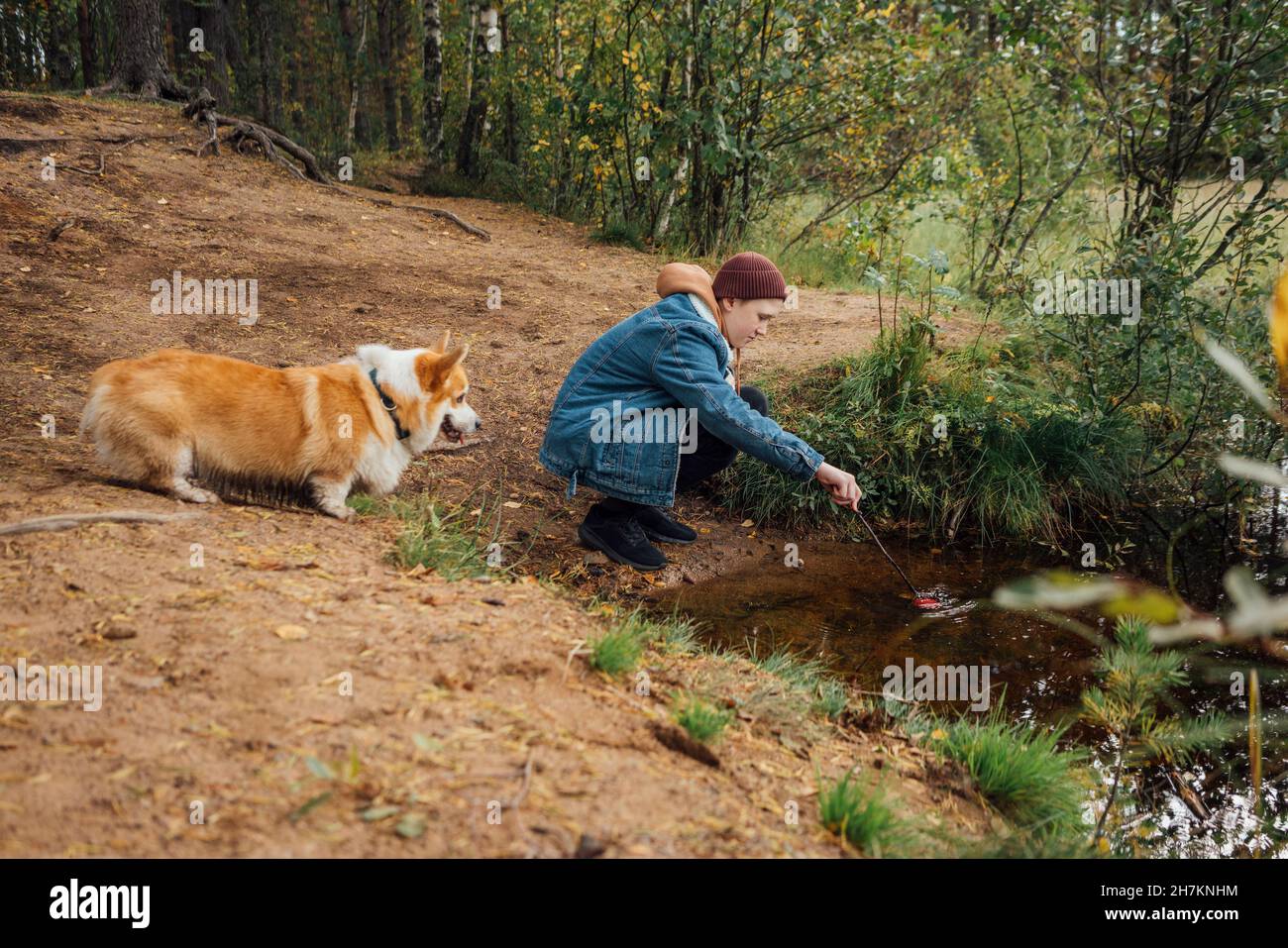 Boy with stick hi-res stock photography and images - Alamy