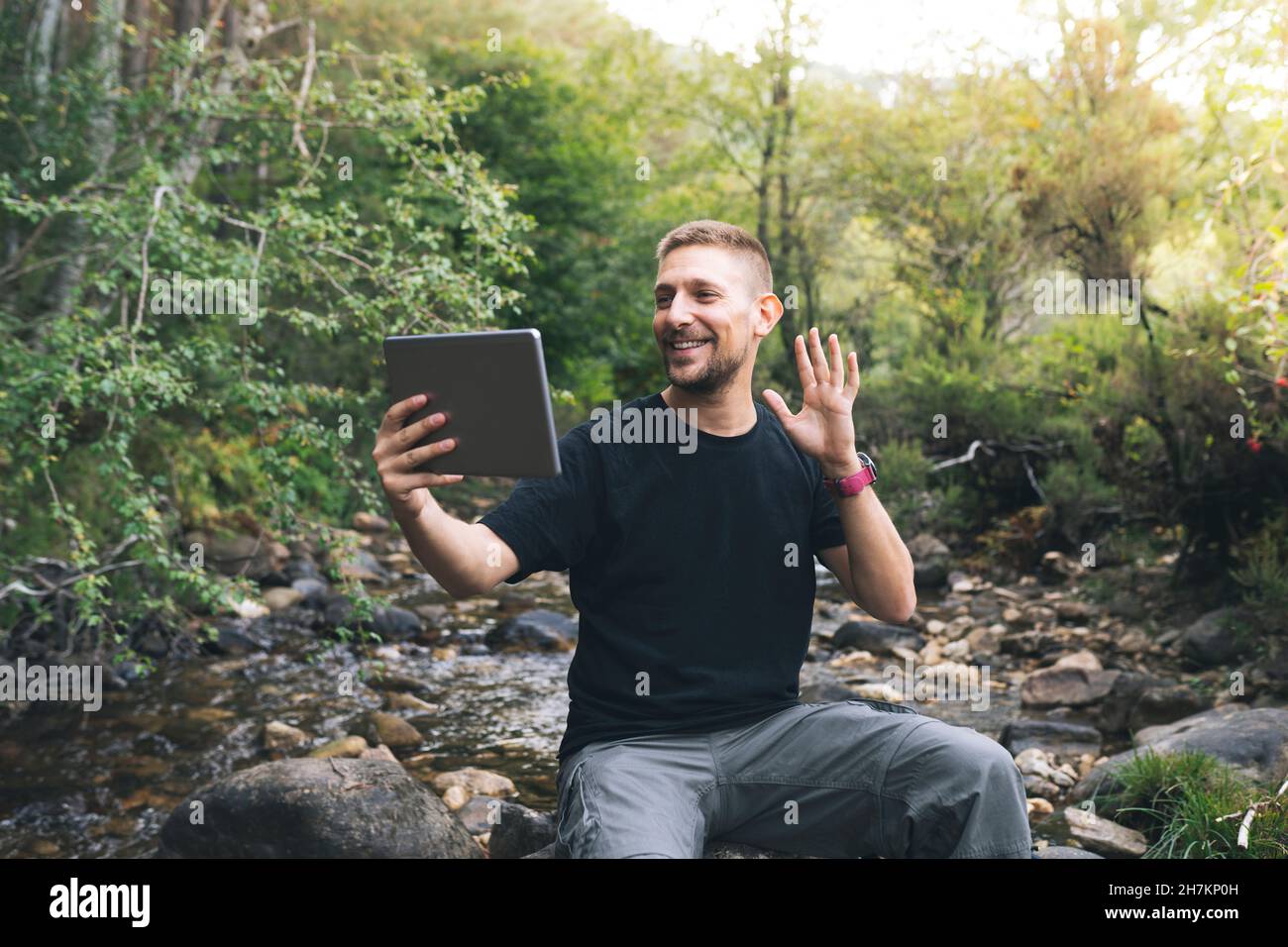 Man with diary contemplating in forest Stock Photo - Alamy
