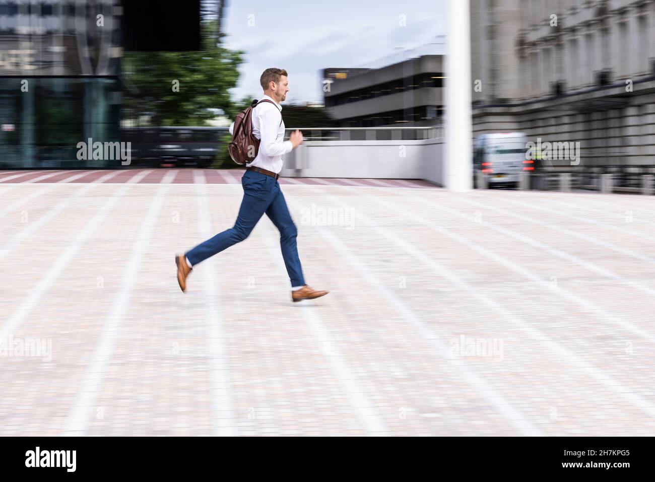 Business person running backpack hi-res stock photography and images ...