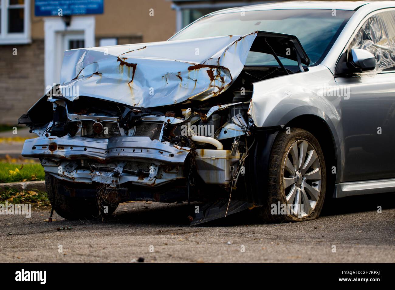 Destroyed car from traffic accident. Car totaled from large traffic ...