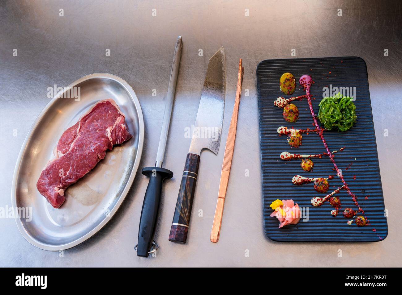 Food decorated by kitchen utensils in restaurant Stock Photo - Alamy