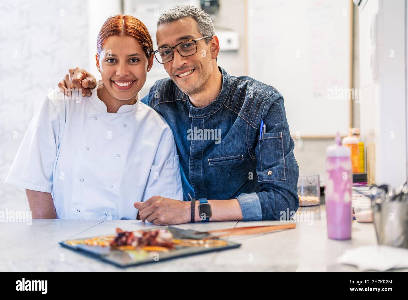 Male female chefs cooking on hi-res stock photography and images - Alamy
