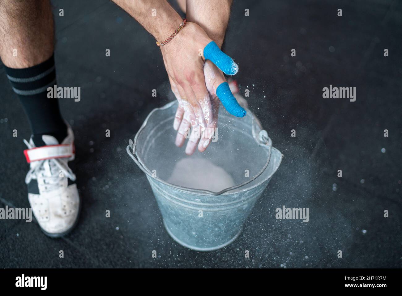 Male athlete applying chalk powder hi-res stock photography and images ...