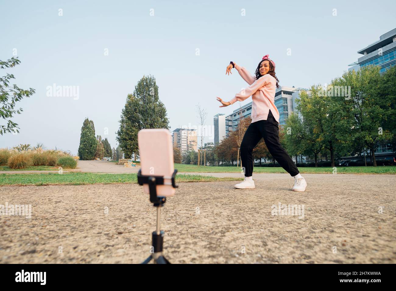 Woman filming with phone hi-res stock photography and images - Alamy