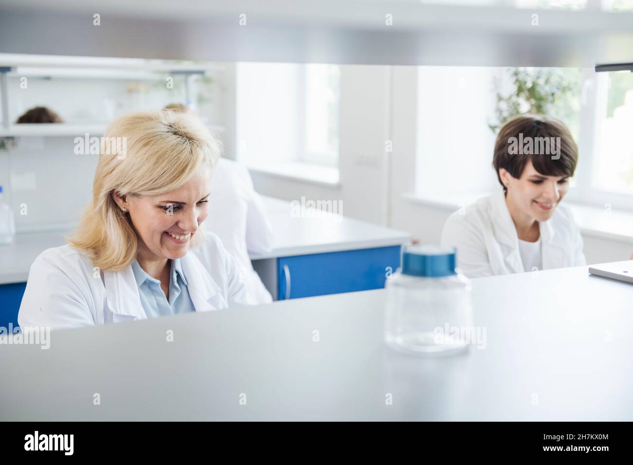 Happy researcher hi-res stock photography and images - Alamy