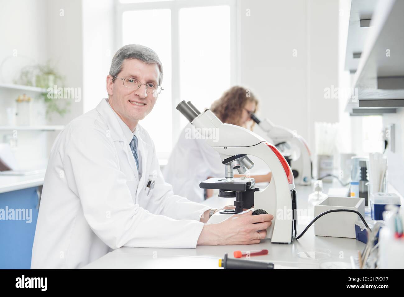 Technician men microscope natural hi-res stock photography and images ...
