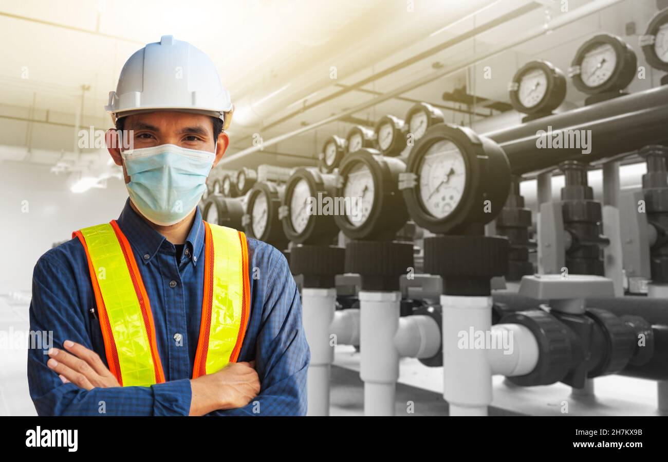 Engineer working in factory for industrial with technology machine ...