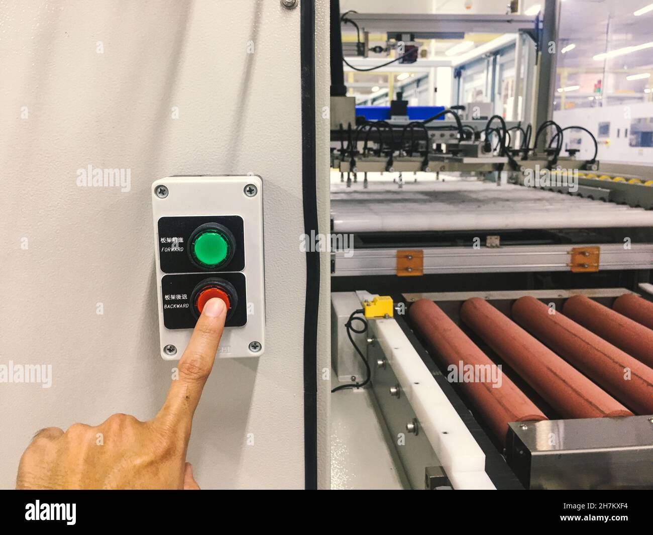 hand touch on button machine in factory industrial Stock Photo - Alamy