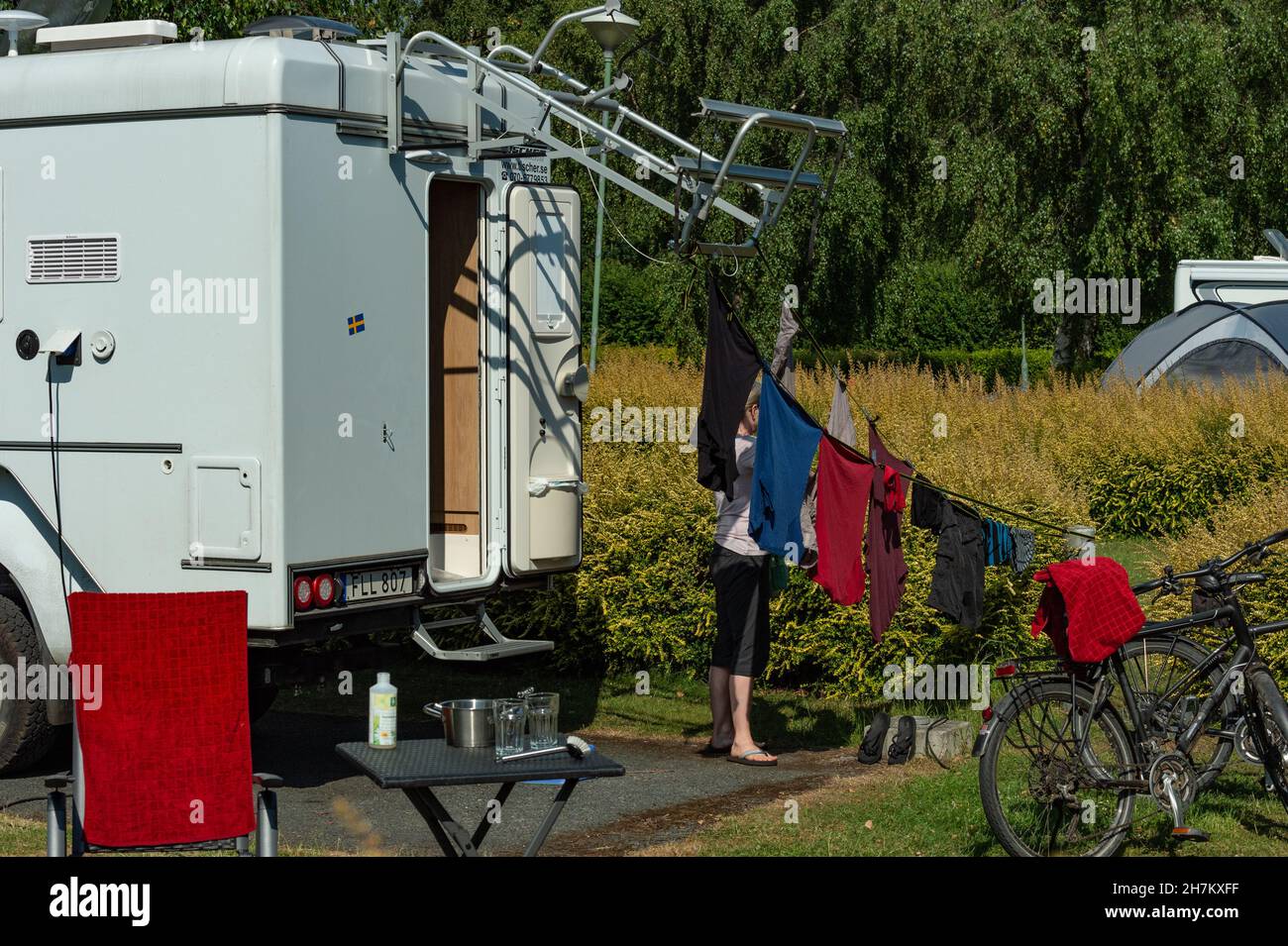 Van with bicycles and clothesline in a square in Dublin, Ireland Stock ...