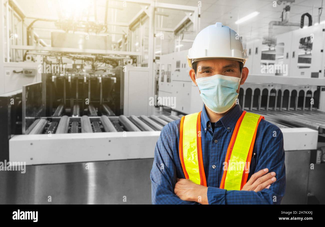 Engineer working in factory for industrial with technology machine ...