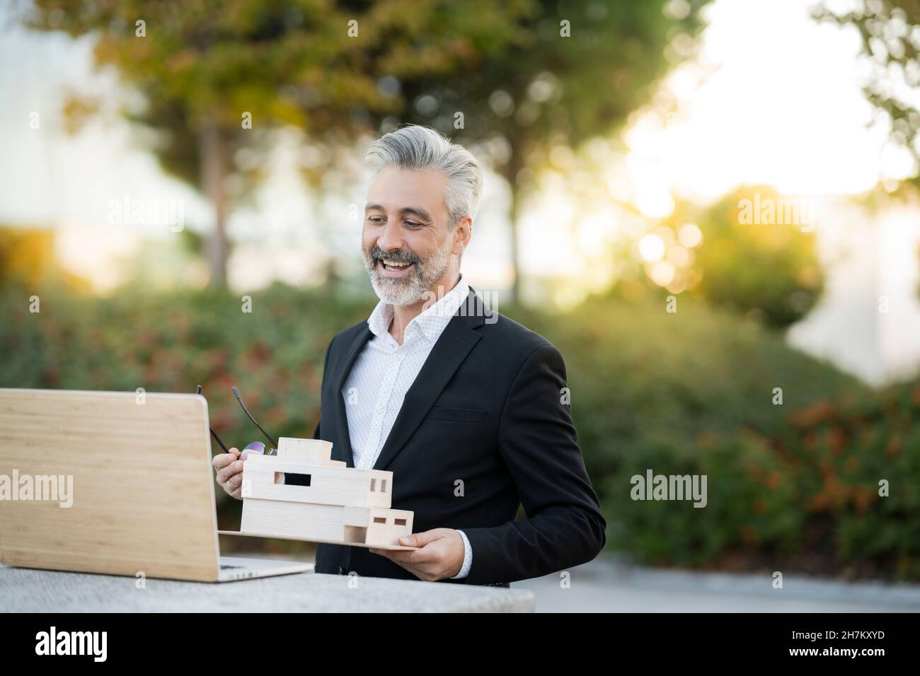 Businessman house model on hi-res stock photography and images - Alamy