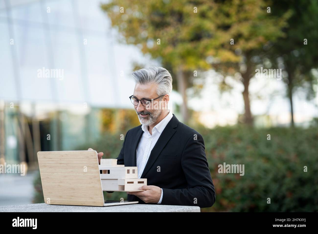Business man laptop model hi-res stock photography and images - Alamy