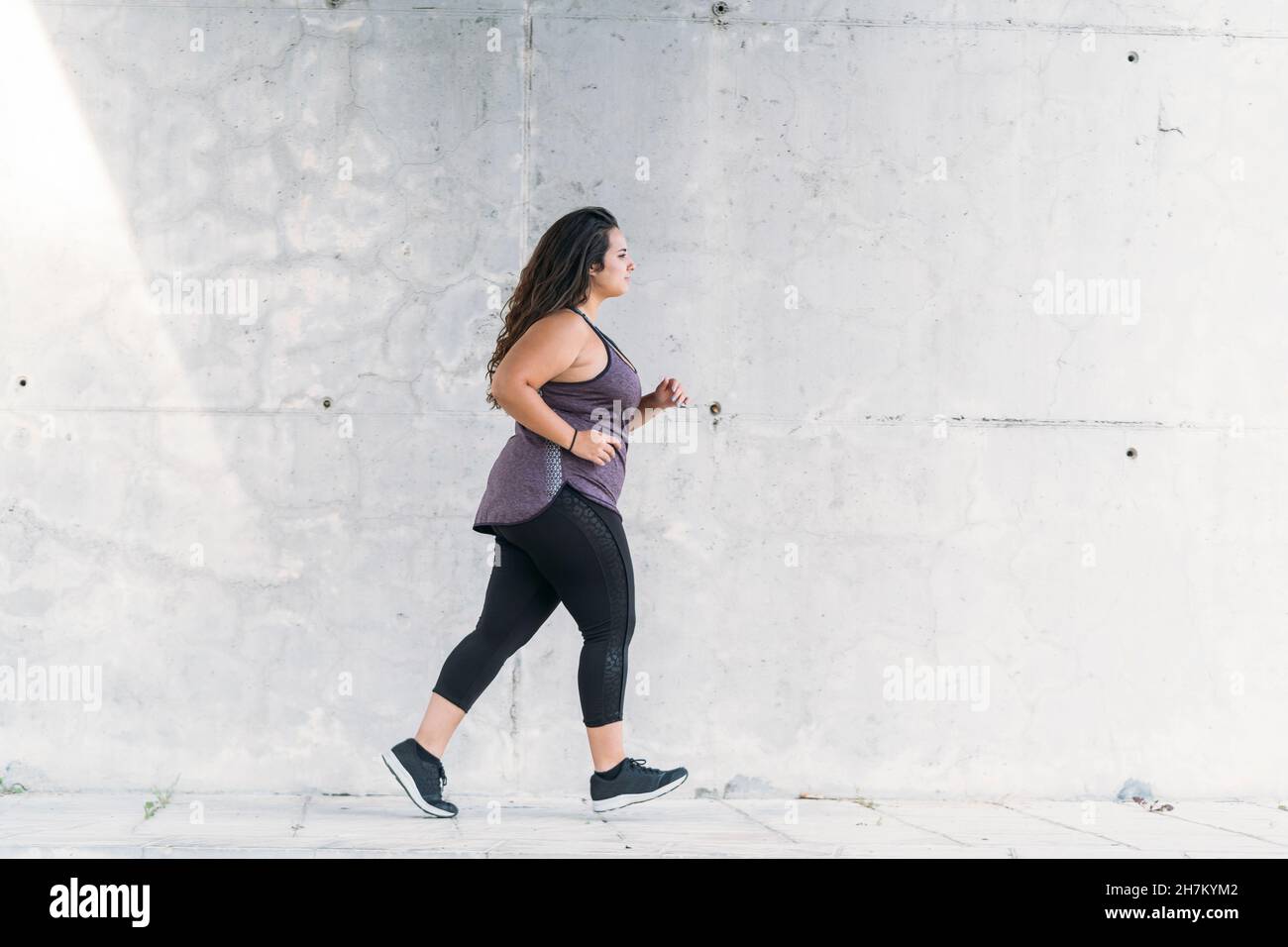 Plus size model running hi-res stock photography and images - Alamy