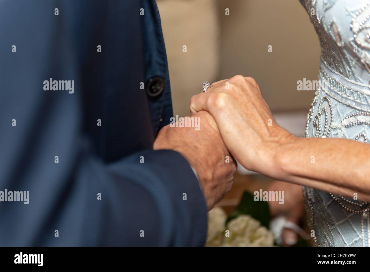 Ring finger of happily married bride proudly displays the wedding band ...