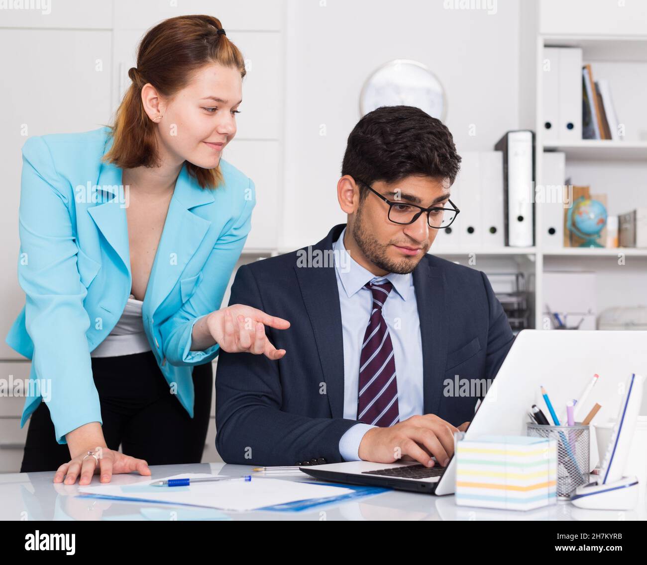 Business partners working in office Stock Photo - Alamy