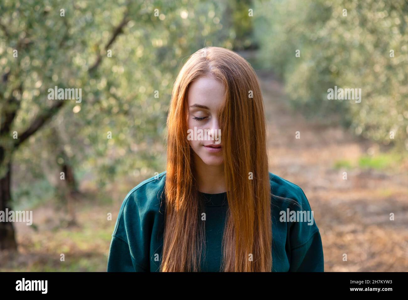 Hair covering woman eye hi-res stock photography and images - Alamy