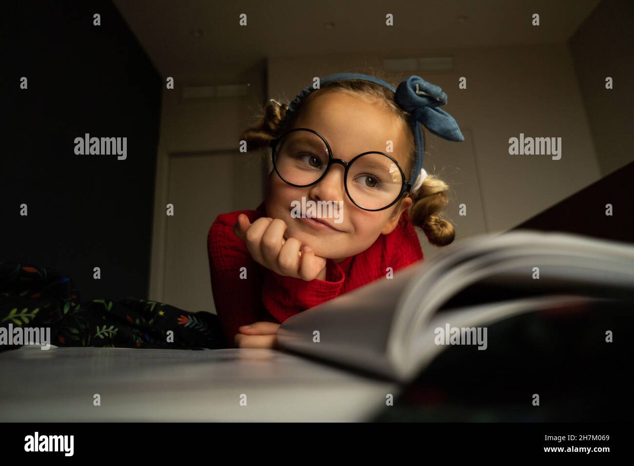 Female resting chin on hand hi-res stock photography and images - Alamy