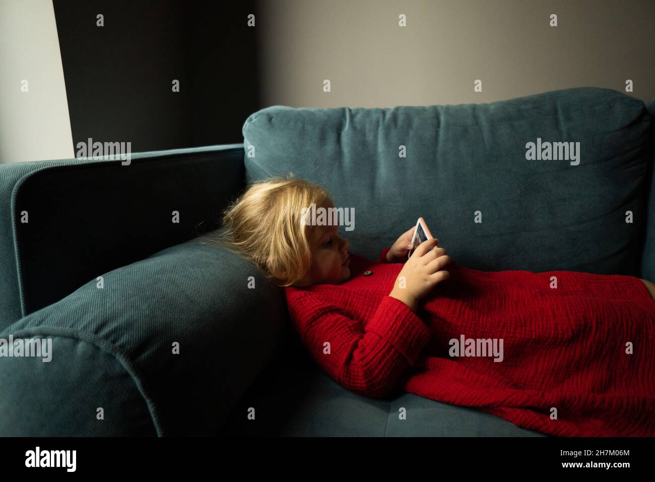Female smartphone resting on sofa hi-res stock photography and images ...