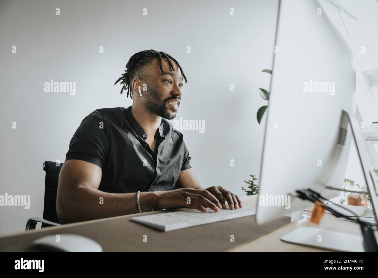 African young using computer hi-res stock photography and images - Alamy