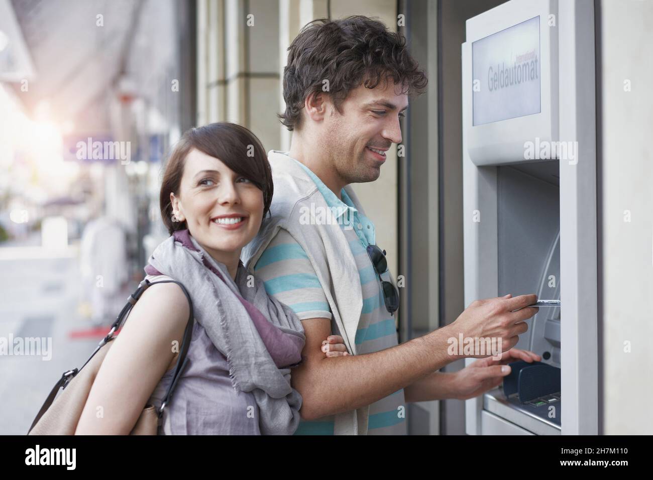 Male withdrawing cash at atm hi-res stock photography and images - Alamy