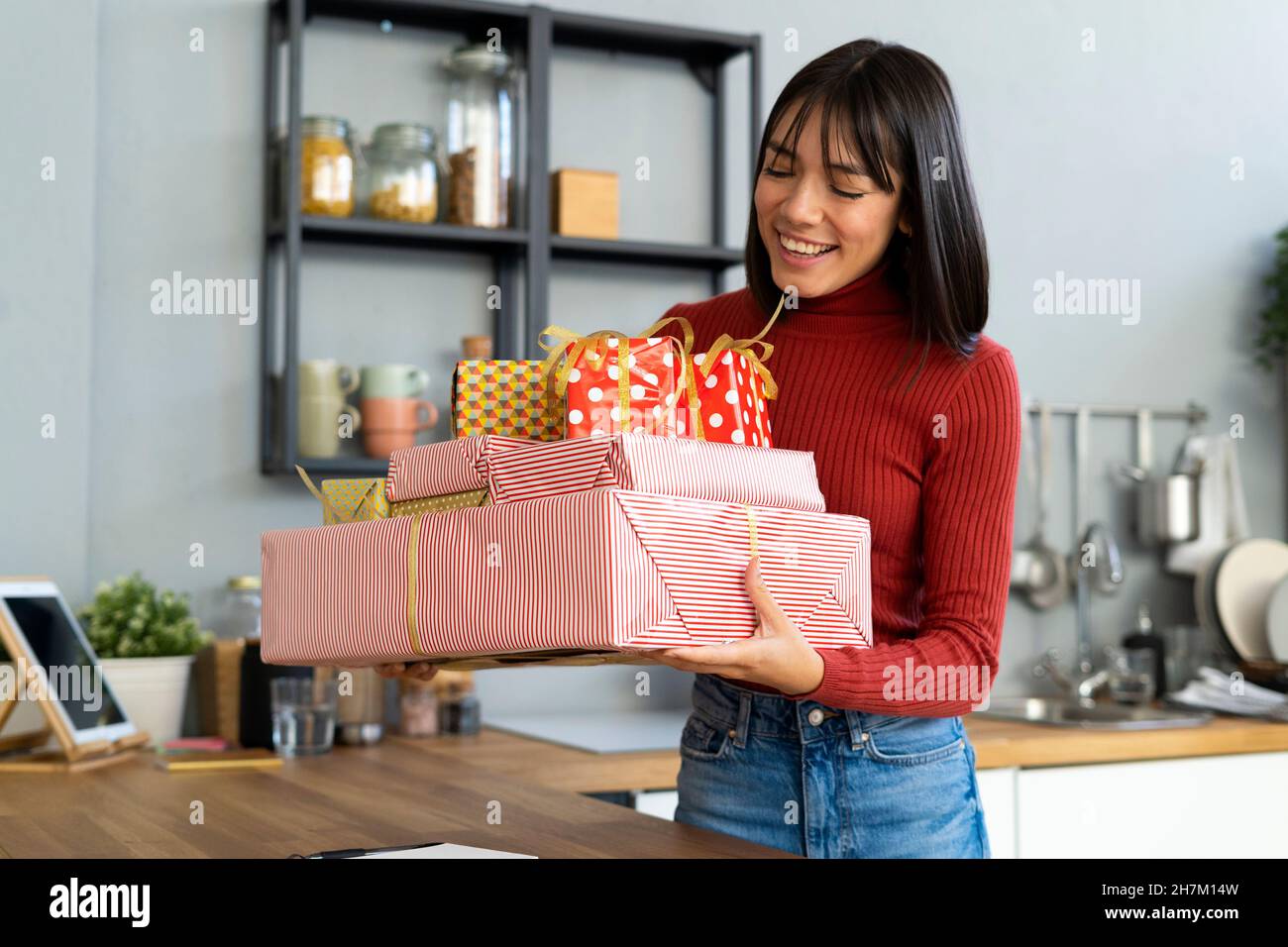 Freelancer keeping gift boxes on desk at home Stock Photo - Alamy