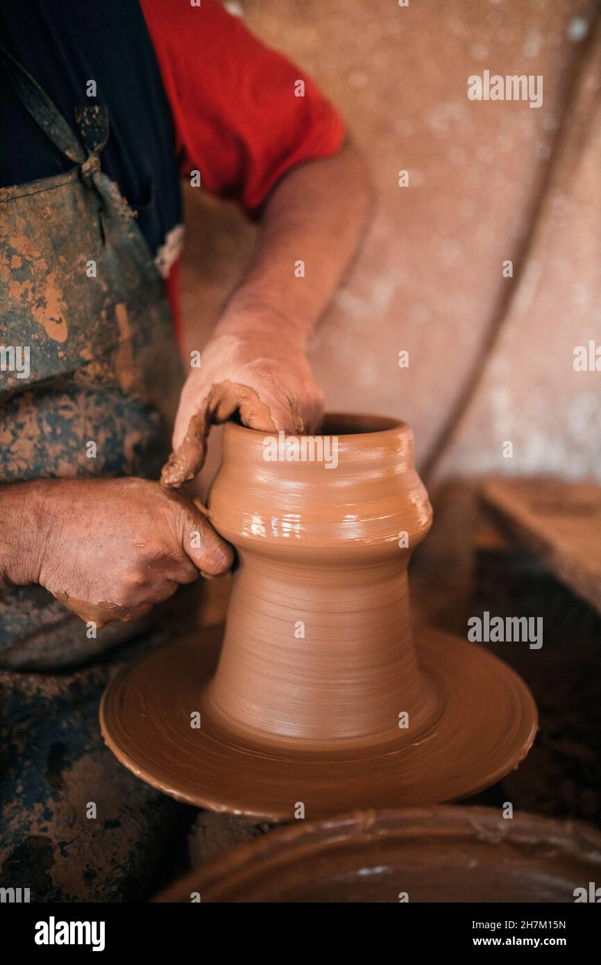 Sitting craftsperson art and craft preparation concentration craft ...