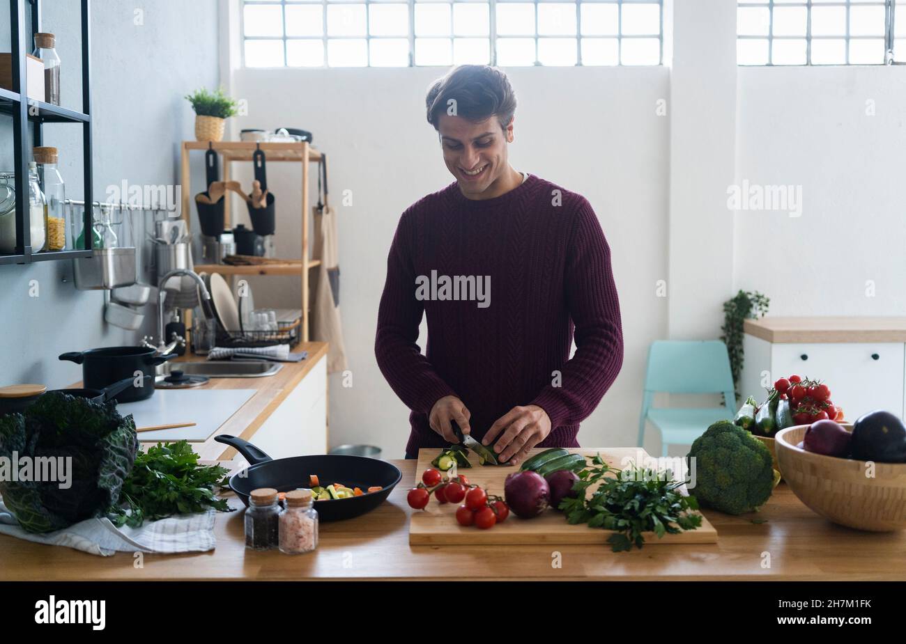 Man preparing lunch in hi-res stock photography and images - Alamy