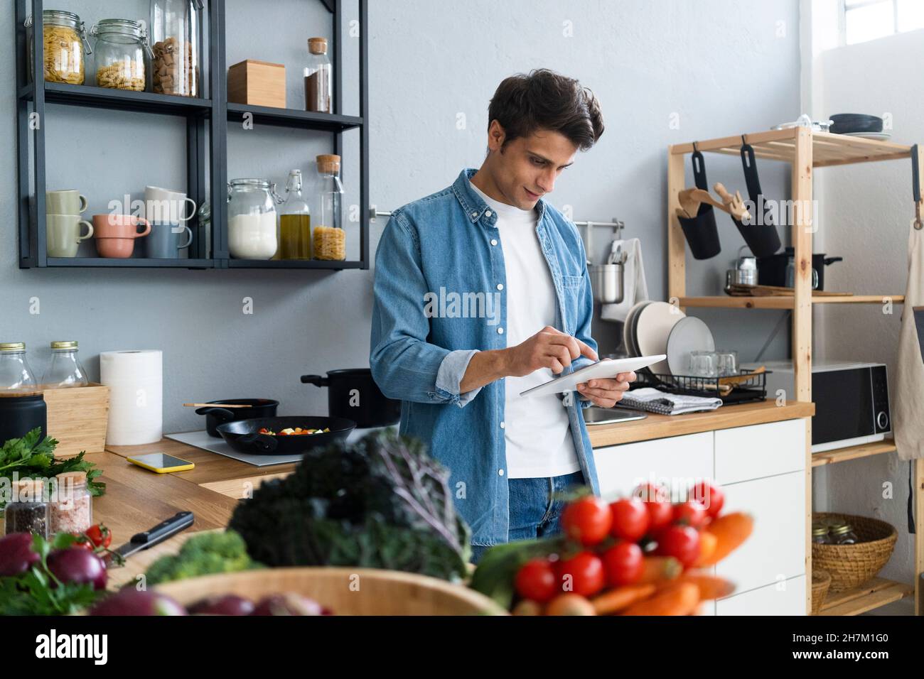 Man preparing lunch in hi-res stock photography and images - Alamy