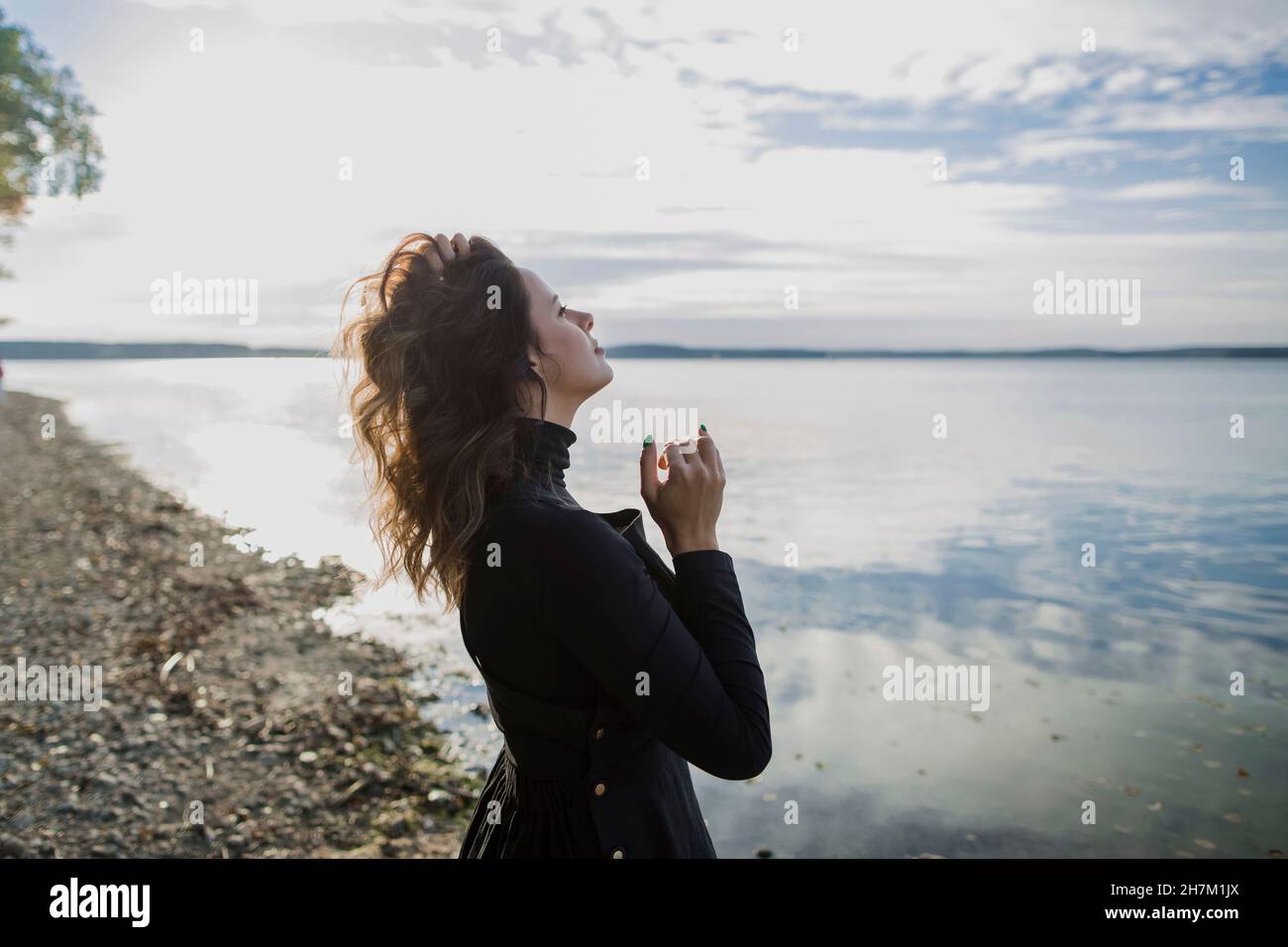 Mature woman looking over lake hi-res stock photography and images - Alamy