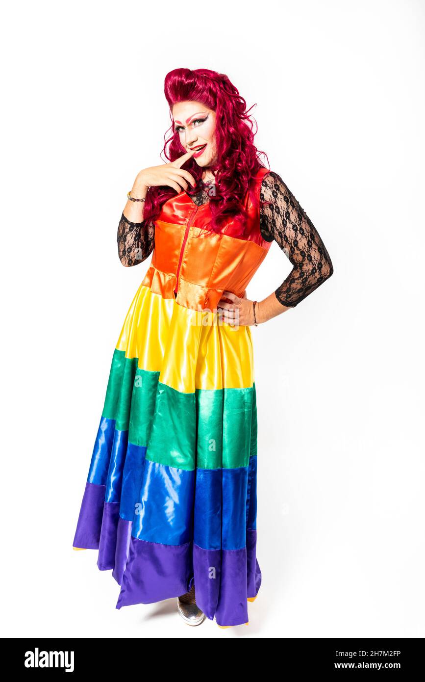 Drag queen with hand fan against white background Stock Photo - Alamy