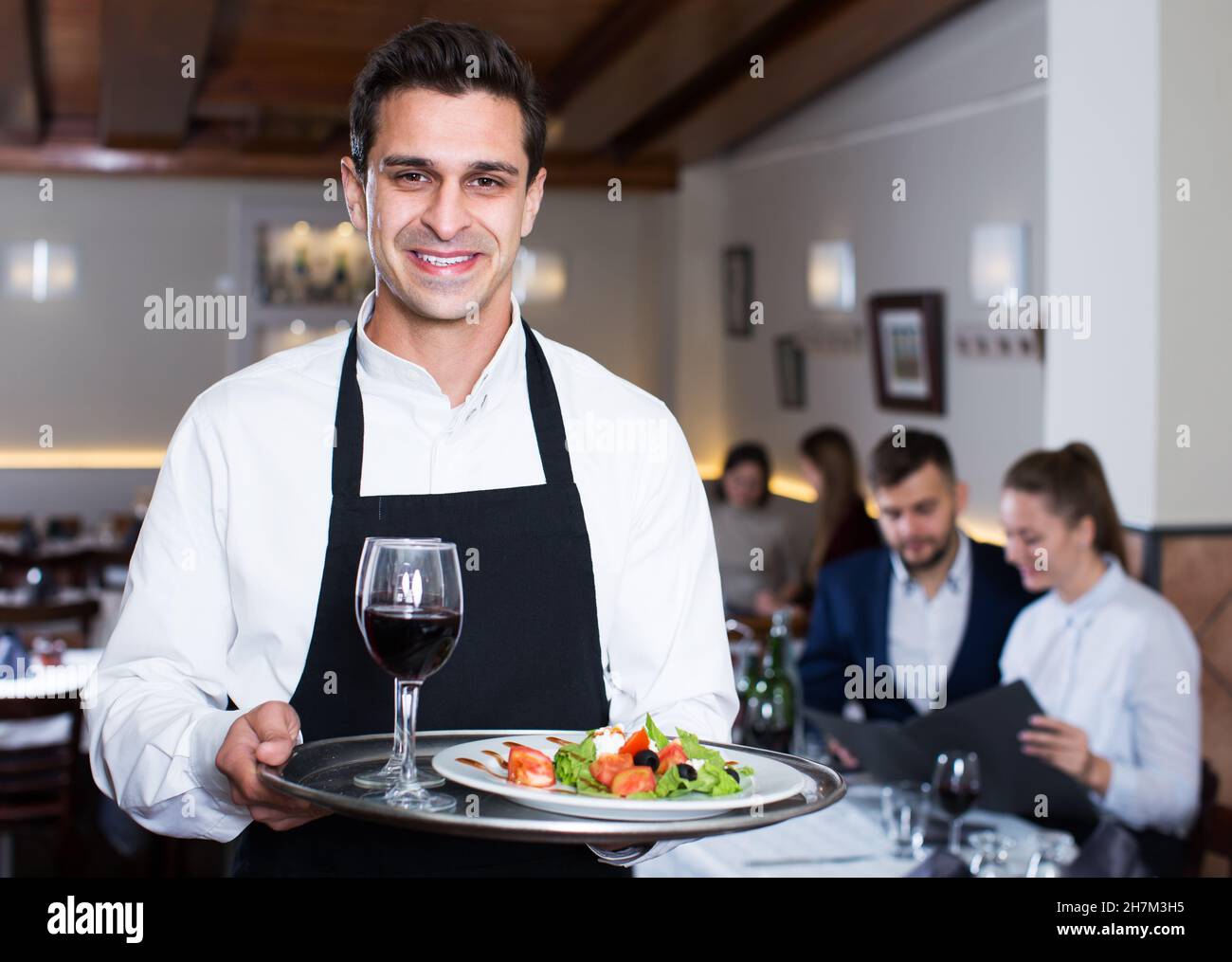 Portrait smiling waiter customers in hi-res stock photography and ...
