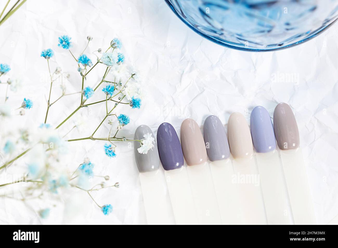 Different color nails polish manicure palette Background. Samples of ...