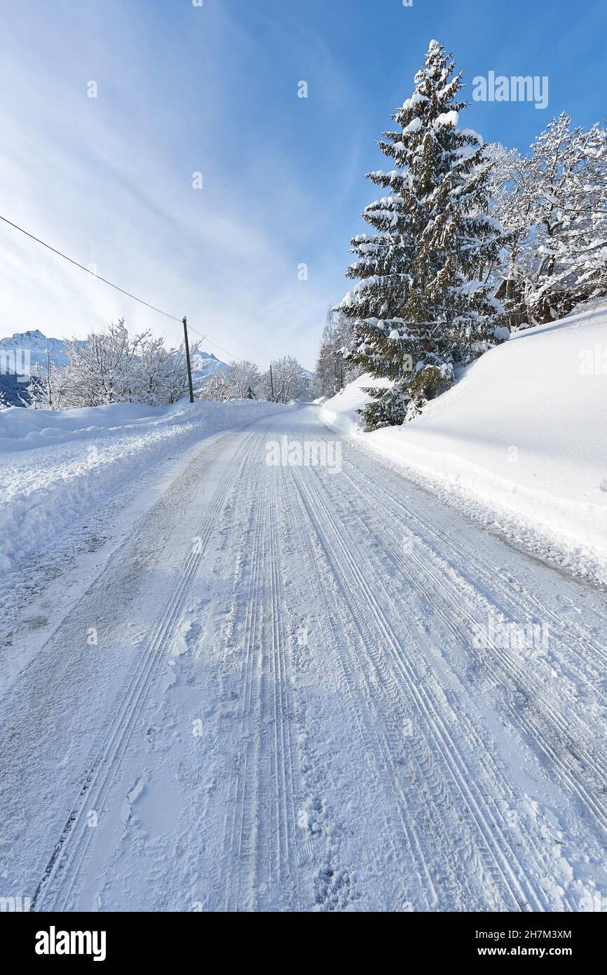 Winter Road in a Village Stock Photo - Alamy