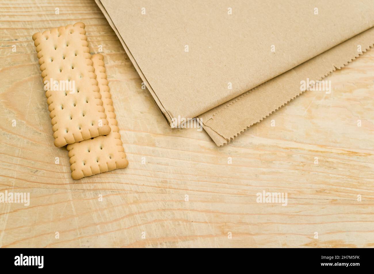 bio organic biscuits on a food paper and rustic wooden background Stock ...