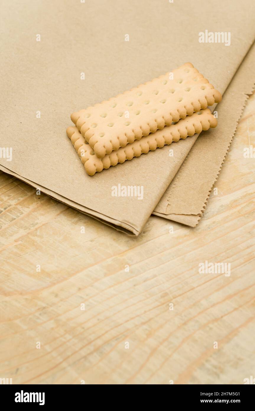 bio organic biscuits on a food paper and rustic wooden background Stock ...