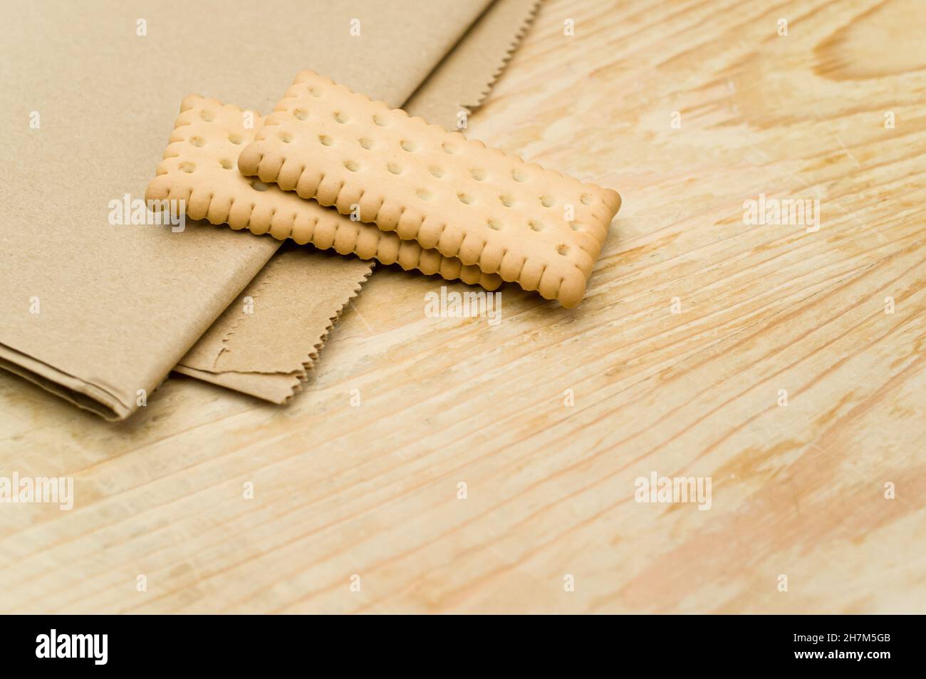 bio organic biscuits on a food paper and rustic wooden background Stock ...