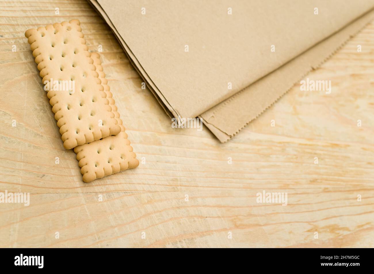 bio organic biscuits on a food paper and rustic wooden background Stock ...