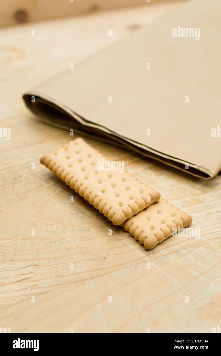 bio organic biscuits on a food paper and rustic wooden background Stock ...