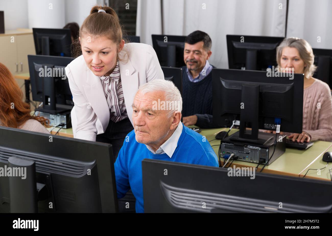 Pointing computer monitor business partners hi-res stock photography ...