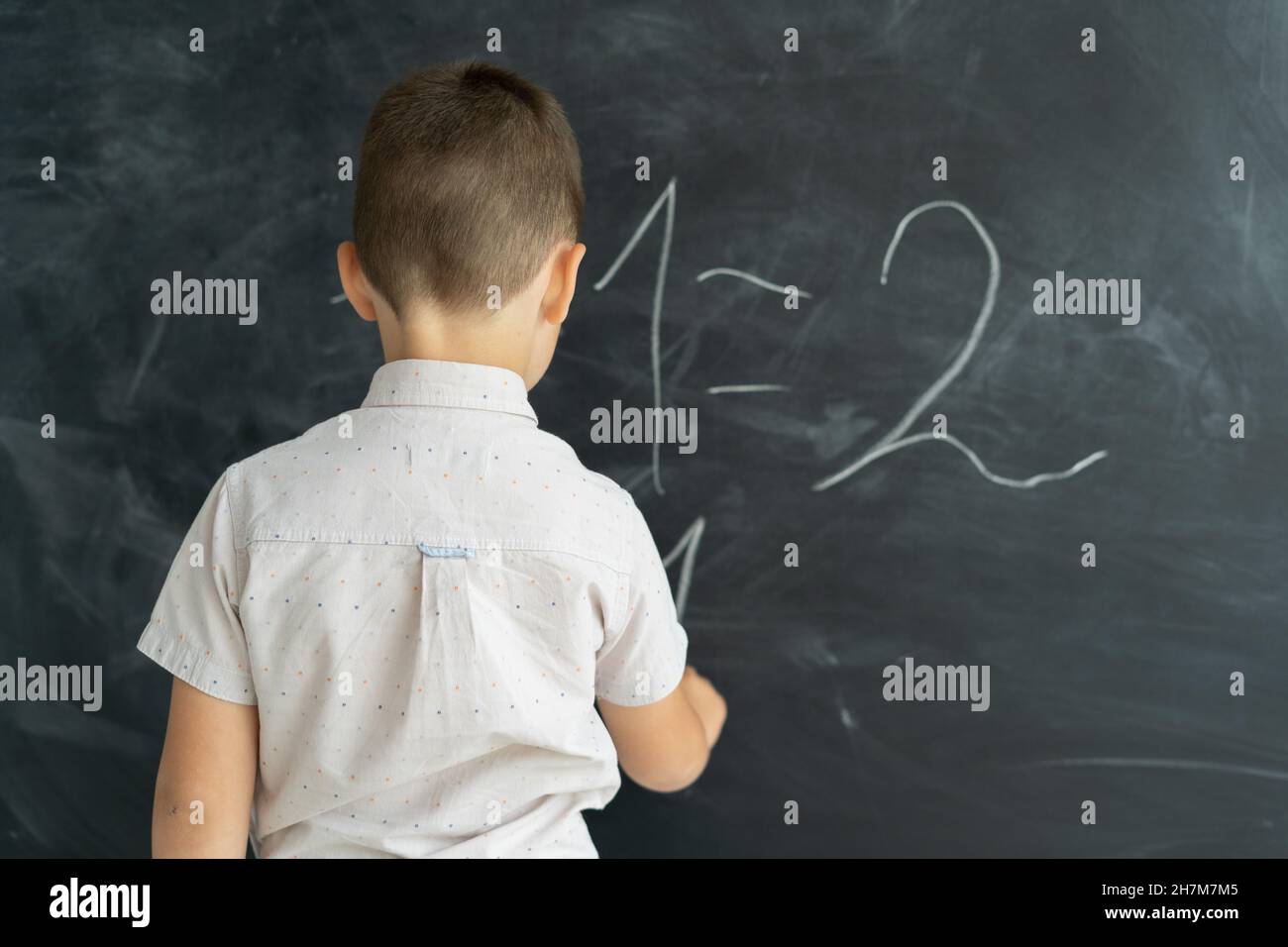 Back view boy student drawing hi-res stock photography and images - Alamy