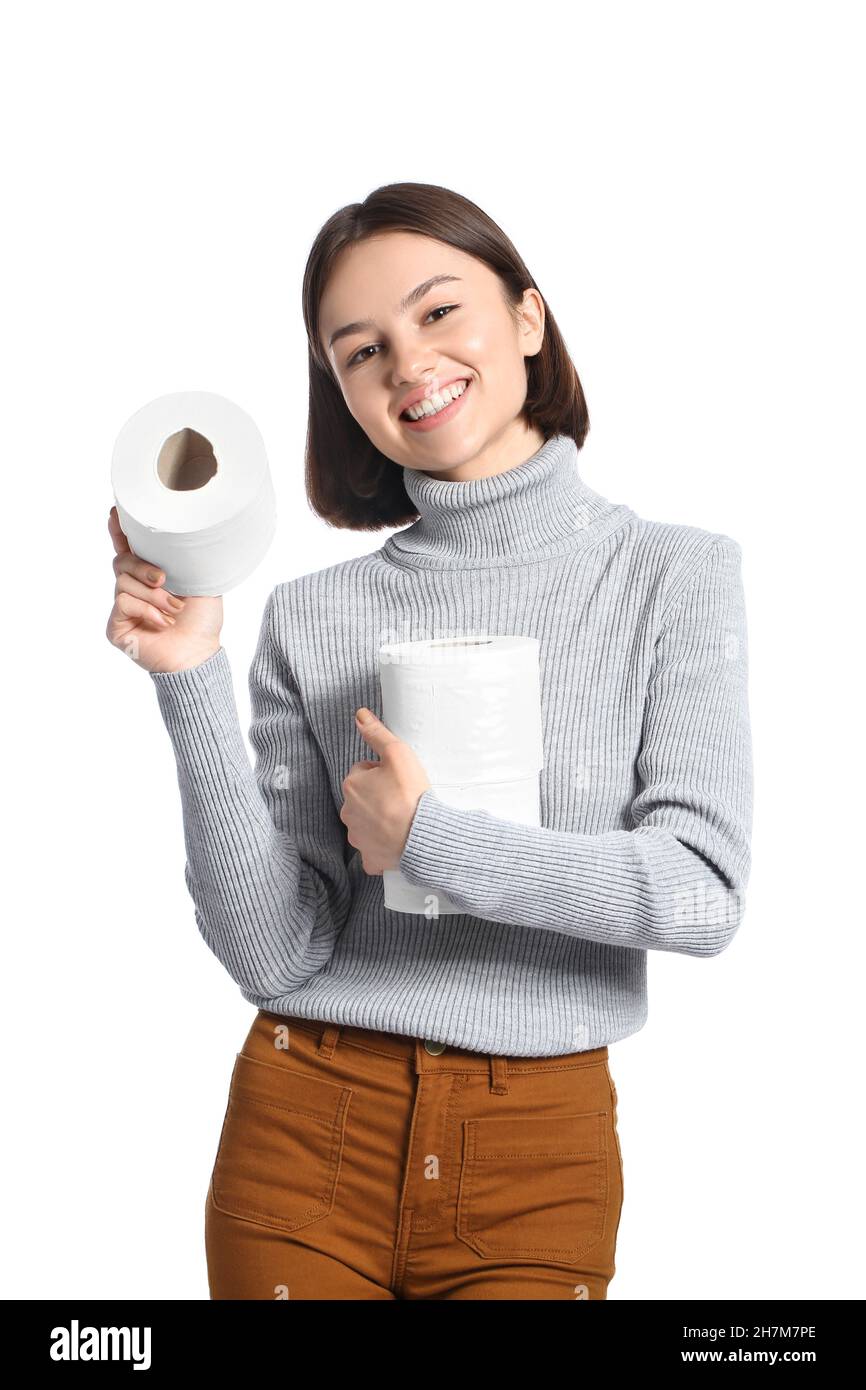 Young woman with toilet paper on white background Stock Photo - Alamy