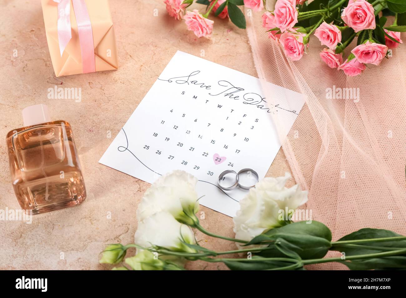 Beautiful composition with wedding calendar on table Stock Photo - Alamy