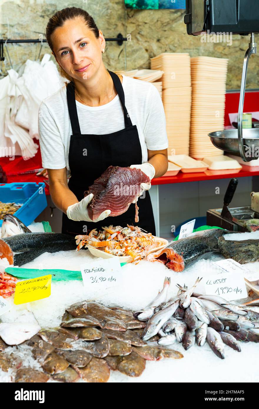 Woman salmon tuna hi-res stock photography and images - Alamy