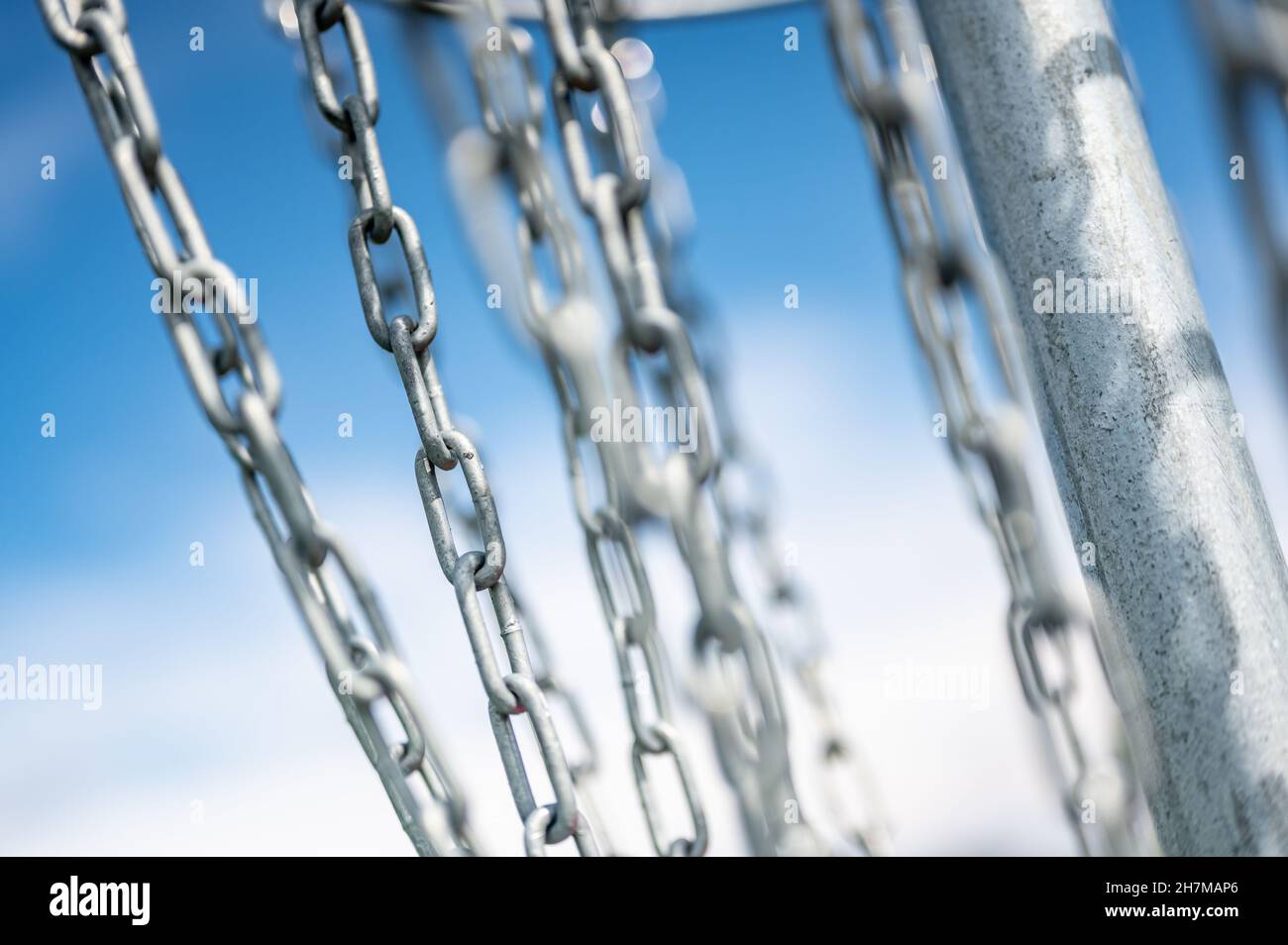 Different angles of view of a disc golf basket and chains Stock Photo ...