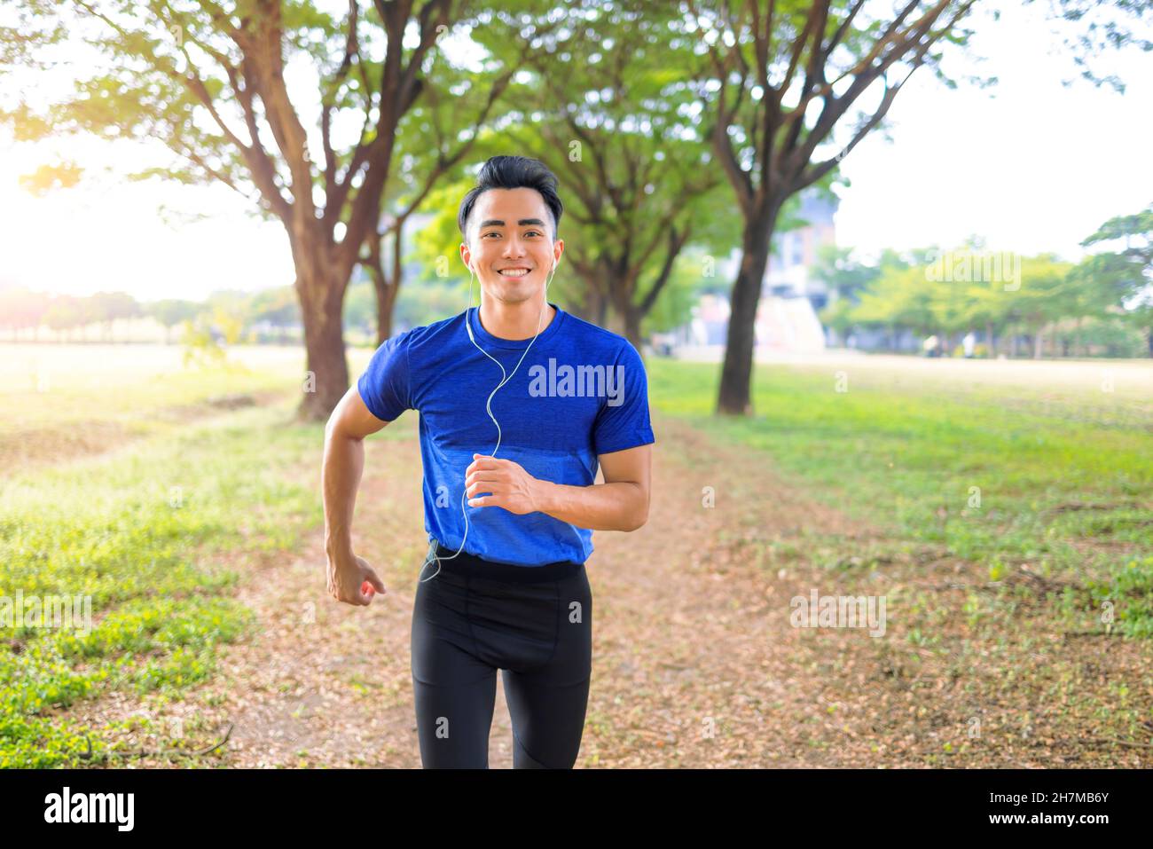 Asian man jogging hi-res stock photography and images - Alamy